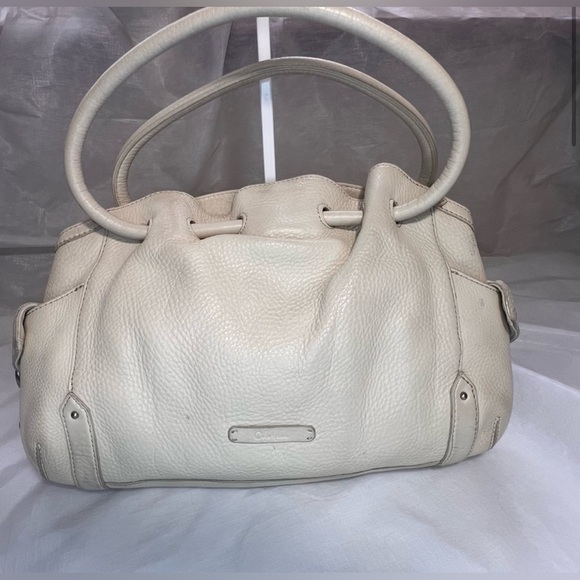 Cole Haan | Bags | Cole Haan Pebbled Ivory Leather Drawstring Handbag ...